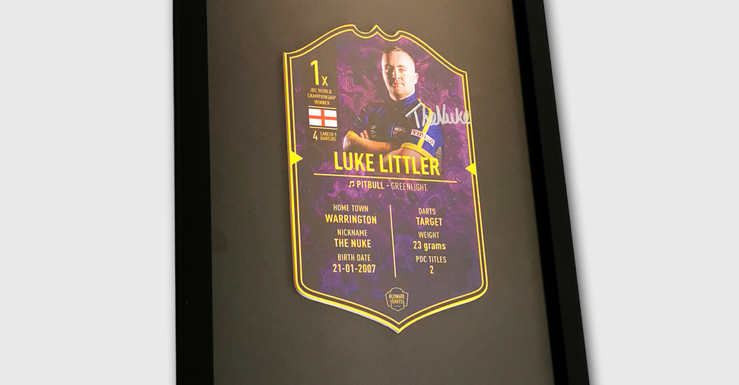 For the Darts World Cup final: Luke Littler's signed darts card
