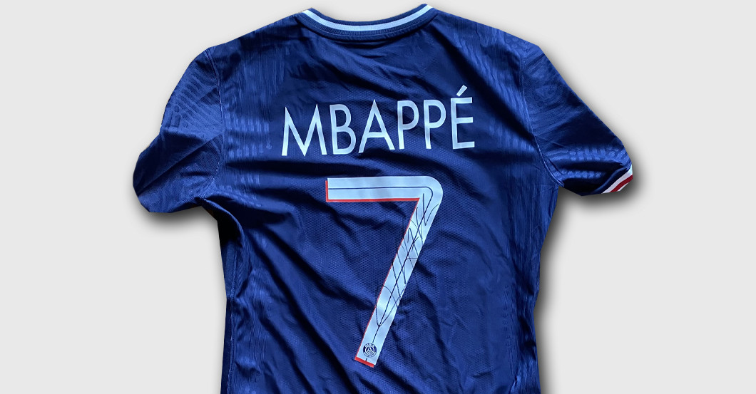 World Star Kylian Mbappe Signs A Champions League Jersey World Star Kylian Mbappe Signs A Champions League Jersey